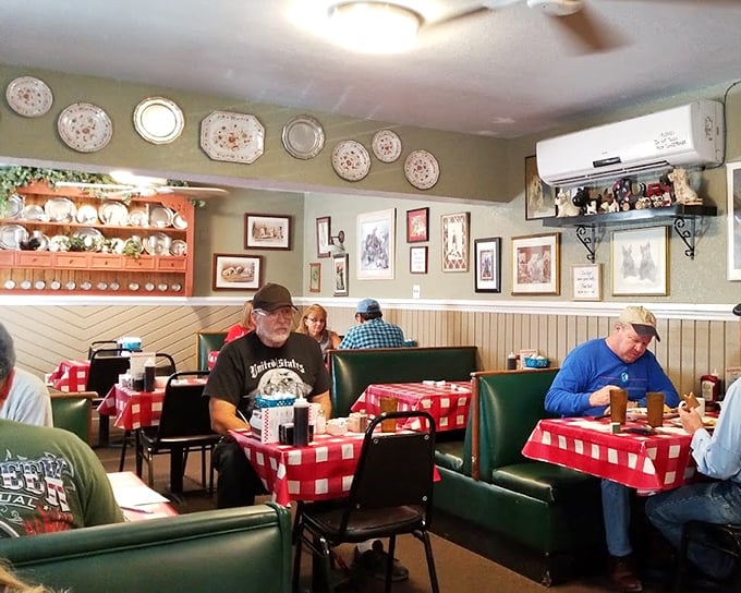 Red checkered tablecloths and decorative plates aren't just decor choices—they're time machines transporting you to the comfort of grandma's kitchen.