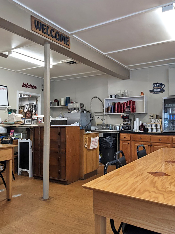 The "WELCOME" sign isn't trying to be ironic—it's genuinely welcoming you to a world where fresh coffee flows and conversation matters.