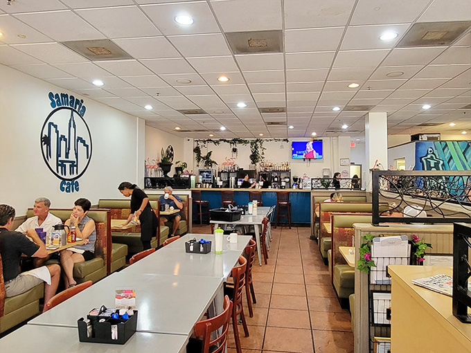 The bright, welcoming interior features comfortable booths and vibrant murals that celebrate Florida's spirit.