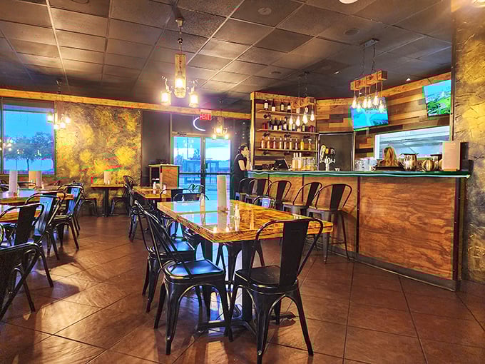 Industrial meets warmth in Leña's dining space, where wood-paneled walls and amber lighting create the perfect backdrop for meat-induced euphoria.