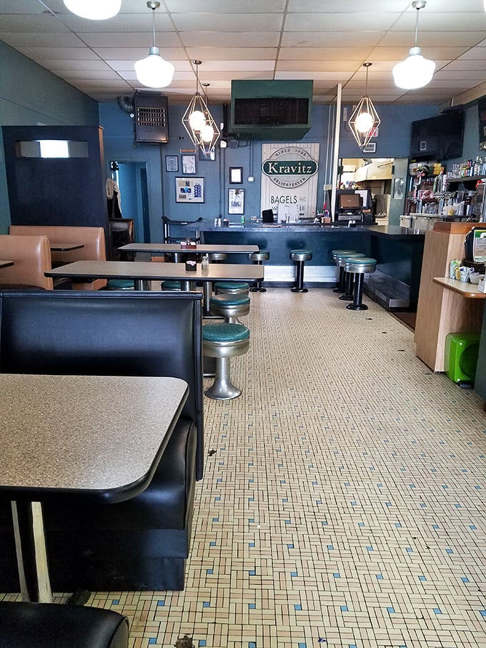 Step inside this timeless deli where chrome stools and checkered floors create authentic old-school charm.