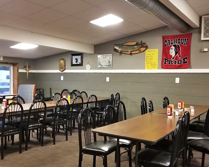 No-frills dining at its finest – where mounted fish on the wall aren't decorative choices but proud trophies, and the Calhoun Pride banner tells you exactly where you are.