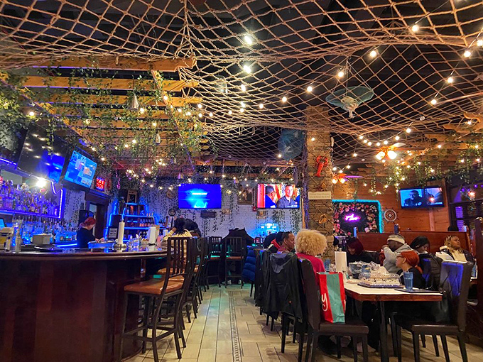 String lights and greenery create an enchanted dining room where seafood dreams come deliciously true every night.
