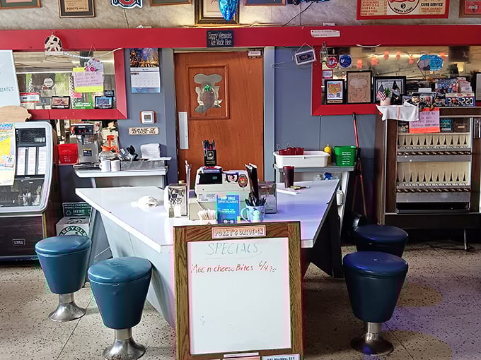 Those blue counter stools aren't just seating—they're front-row tickets to the greatest show in Mansfield: watching milkshake magic happen before your eyes.