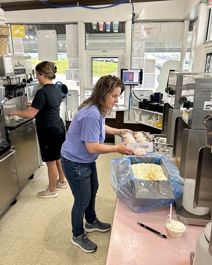 Behind the counter, the choreography of ice cream artisans is mesmerizing—a well-practiced dance of scoops, swirls, and toppings that's been perfected over decades.
