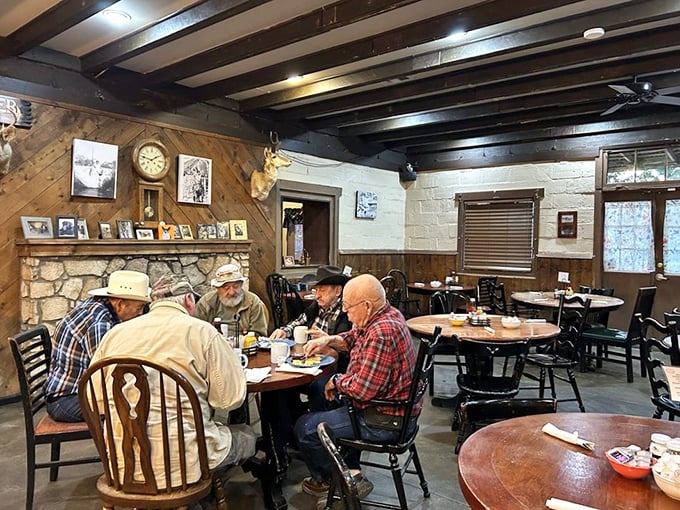 Where cowboys and city slickers break bread together beneath wooden beams and watchful deer mounts. This isn't décor—it's Arizona's living room.