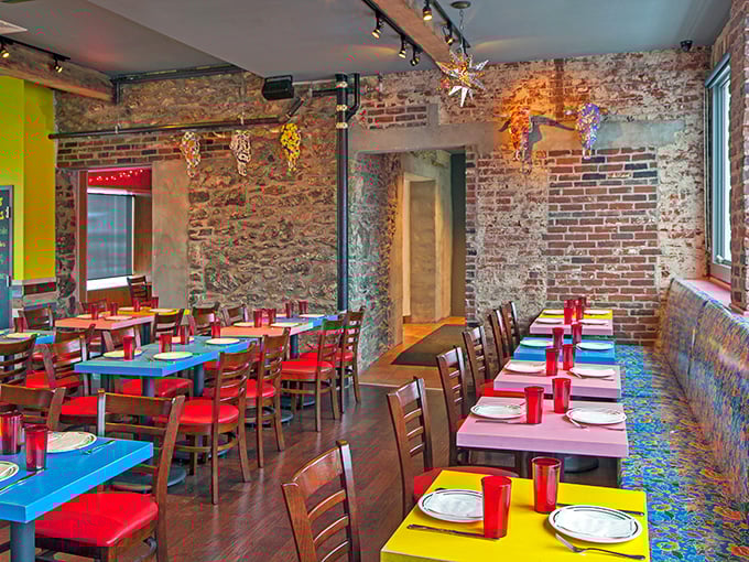 Exposed brick walls meet colorful tables in a space that feels like your coolest friend's dining room—if that friend happened to make incredible tacos.