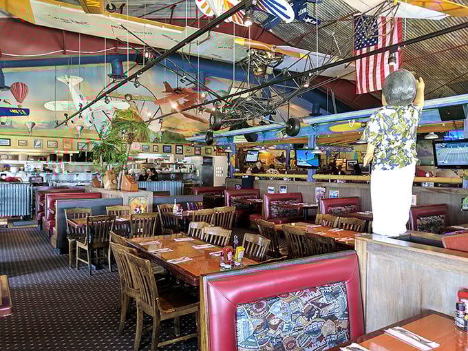 Step inside and you're immediately transported to an aviation wonderland, where model planes dangle from the ceiling and every meal feels like a first-class experience.