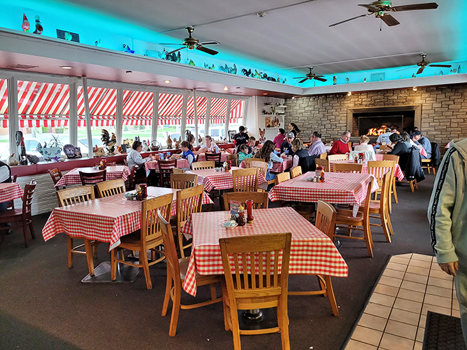Red checkered tablecloths create the perfect picnic atmosphere without worrying about ants or weather forecasts.