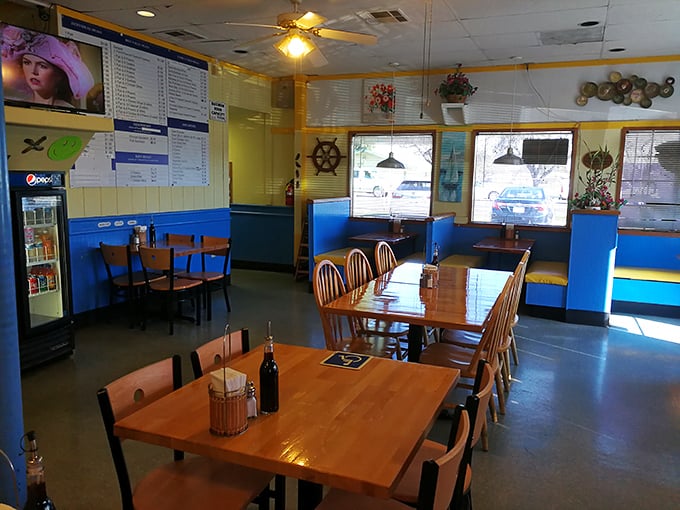 Simple wooden tables and nautical-themed decor create that perfect "no-frills" atmosphere where you know the food, not the furniture, is the star attraction.
