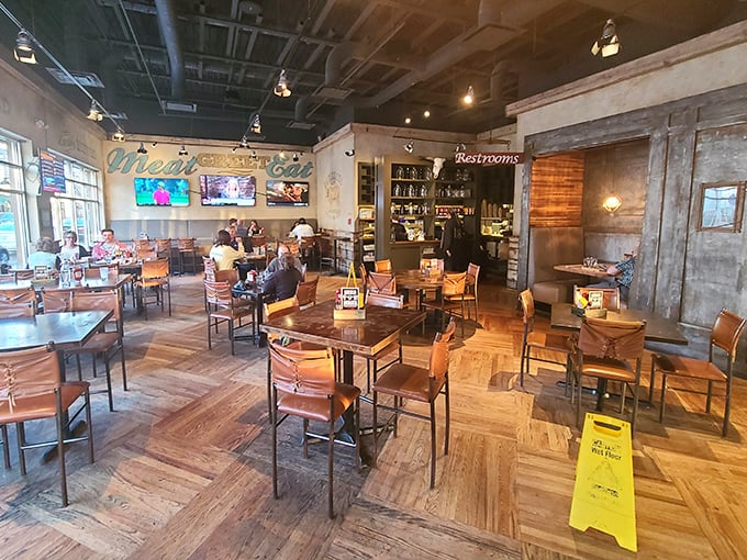 Industrial-chic meets comfort at Flip Side's interior, where every wooden table is a stage for the upcoming food drama.