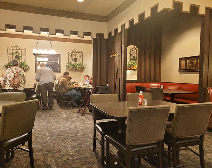 Step inside and the medieval-inspired interior transports you to a simpler era of dining—when wood paneling was king and comfort trumped trendiness.