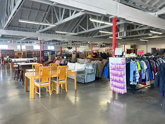 Inside, the warehouse-like space reveals its true magnitude—furniture, clothing, and treasures stretching as far as the eye can see.