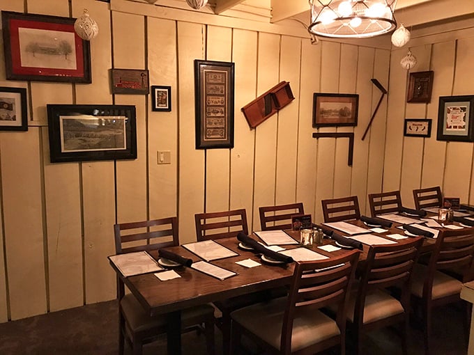 The dining room's rustic charm comes from authentic farm implements and historical photographs that create an atmosphere as comforting as the food about to arrive.