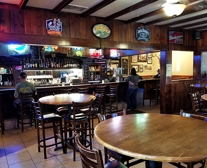 Wood paneling, classic beer signs, and that unmistakable steakhouse glow—this is where memories are made and diets are forgotten.