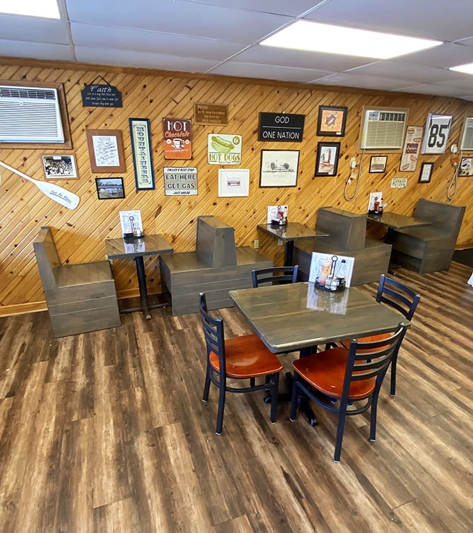 Wood-paneled walls adorned with quirky signs create that perfect small-town diner atmosphere – where conversations flow as freely as the coffee.