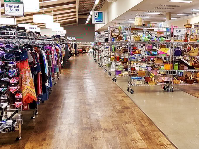 Aisles wide enough for cart-to-cart passing—a luxury in thrift store design. Left: fashion finds. Right: household treasures awaiting adoption.
