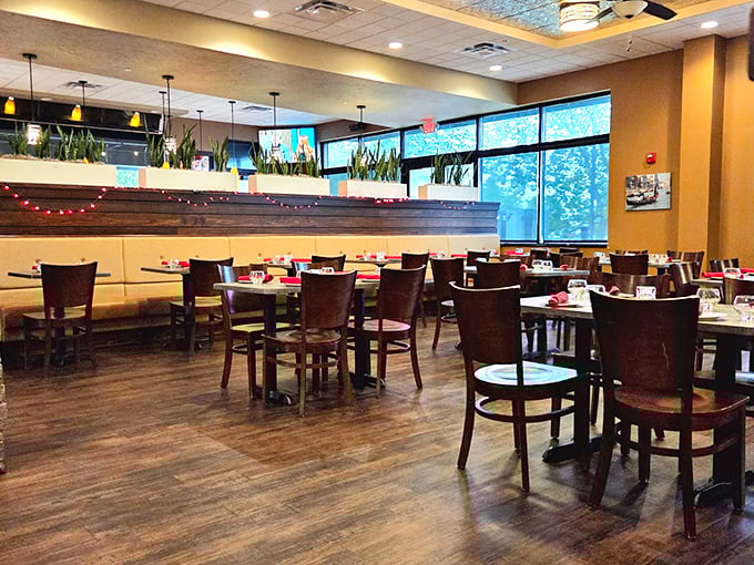 Warm wood tones, string lights, and comfortable seating create that perfect "why rush?" atmosphere where lingering over a second glass of wine feels mandatory.