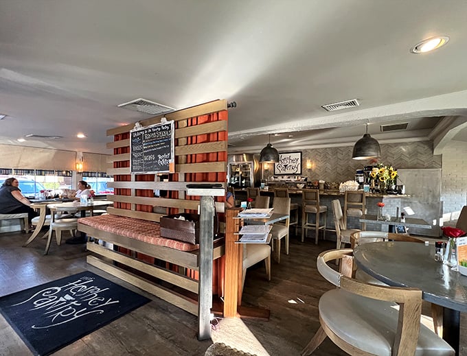 Modern rustic charm defines the interior, where wood accents and comfortable seating invite you to linger over coffee.
