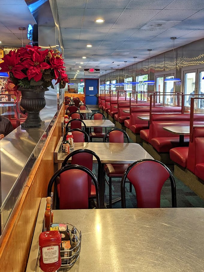 Red vinyl booths and formica tables aren't trying to be retro here—they're the genuine article, seasoned with decades of conversations and coffee refills.