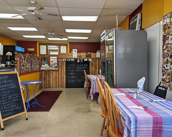 No fancy chandeliers or pretentious décor here—just colorful tablecloths, chalkboard menus, and the promise of honest-to-goodness cooking that speaks directly to your soul.