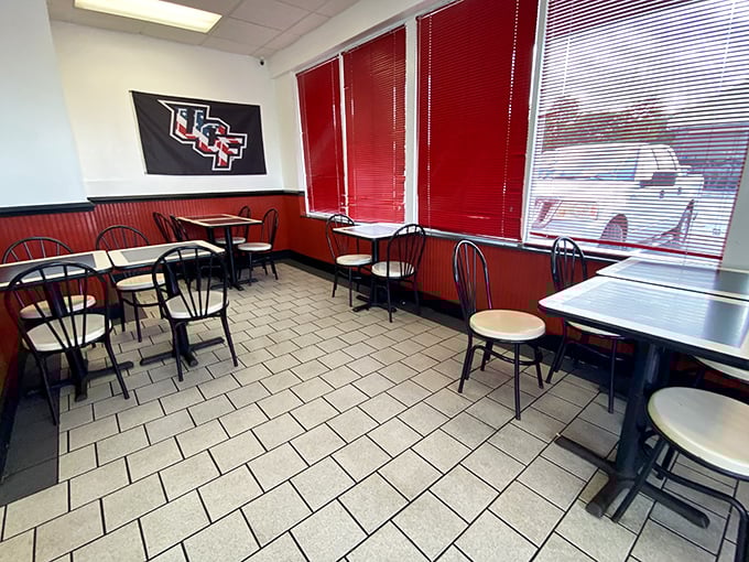 UCF pride meets no-frills dining in this cozy interior where the red accents aren't trying to be trendy—they're just continuing a tradition that never needed updating.
