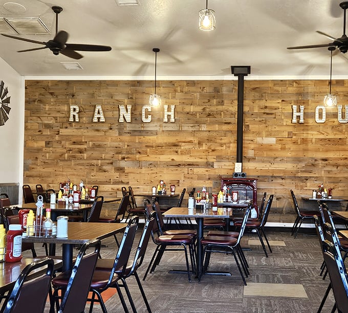 Step inside and the rustic wooden wall announces you've arrived somewhere authentic – no Instagram-engineered decor, just honest charm that says "sit down and stay awhile."