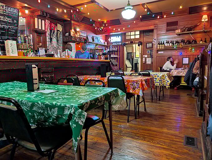 Christmas lights twinkle year-round above mismatched tablecloths in this cozy dining room. It's like your eccentric aunt's house—if your aunt happened to be a culinary genius.