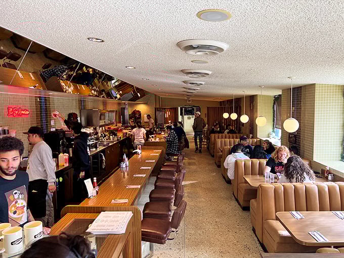 Where nostalgia meets comfort – Clark Street Diner's interior balances retro charm with modern cleanliness, making it the Goldilocks of dining spaces: just right.