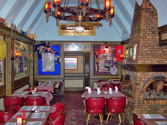 Step inside and discover a rustic wonderland where exposed beams meet red leather chairs in perfect dining harmony.