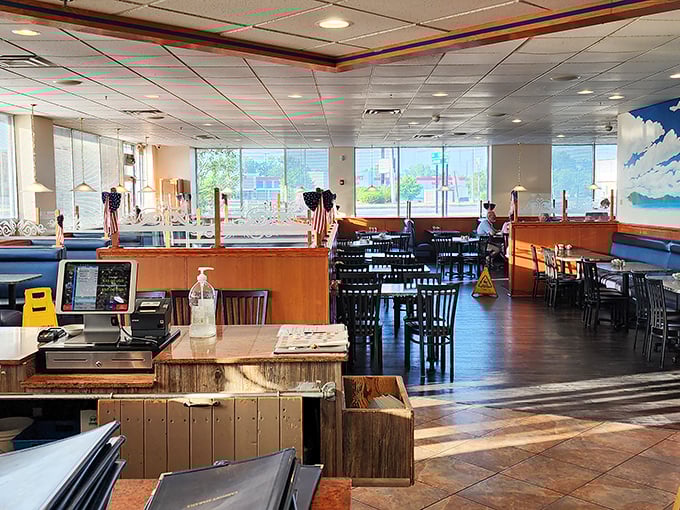 Classic diner ambiance with a touch of blue sky artistry – where conversations flow as freely as the coffee refills.