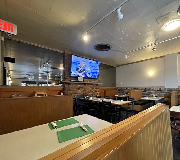 Wooden booths and brick accents create that perfect diner atmosphere—not designed by committee, but evolved through decades of serving happy customers.