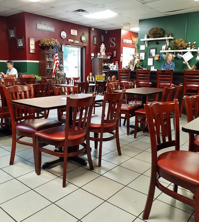 Red and green walls create the perfect backdrop for morning conversations and coffee refills that never seem to end.