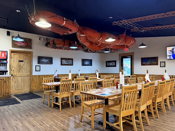 Nautical charm meets practical comfort inside Scooter's, where fishing nets overhead remind you exactly where your dinner recently resided.