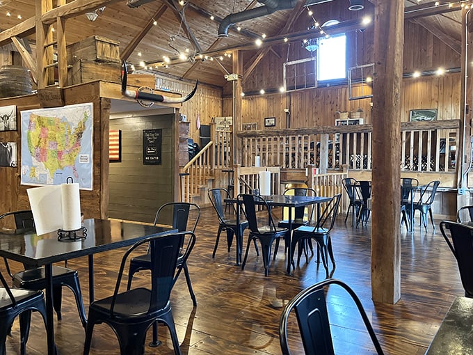 Rustic wooden beams, string lights, and that all-American map on the wall—this isn't just a restaurant, it's a love letter to barbecue tradition with modern industrial touches.