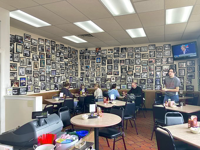 Wall-to-wall memories line this diner where every photograph tells a story and every table holds the promise of perfect home fries.