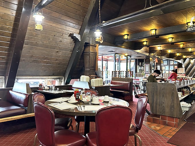 Step inside and the wooden beams transport you to a cozy mountain lodge where calories don't count and coffee refills flow like mountain streams.