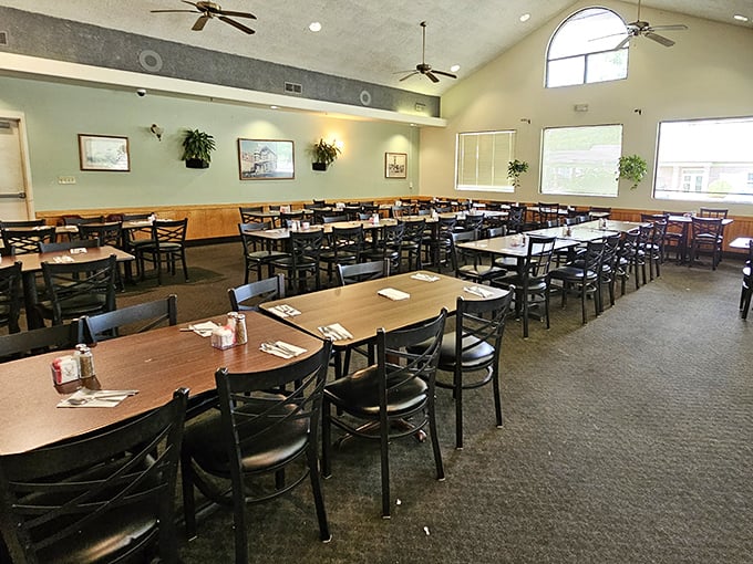 Spacious yet cozy, Rob's dining room balances function and comfort with its high ceilings, natural light, and no-nonsense seating that says, "Stay awhile, we've got pie."