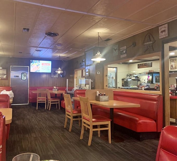 Red vinyl booths that have cradled more conversations than a therapist's couch – and probably solved more problems too.