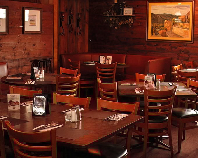 Warm wood paneling and comfortable seating create the perfect backdrop for serious eating. No distractions here – just you and your imminent food happiness.