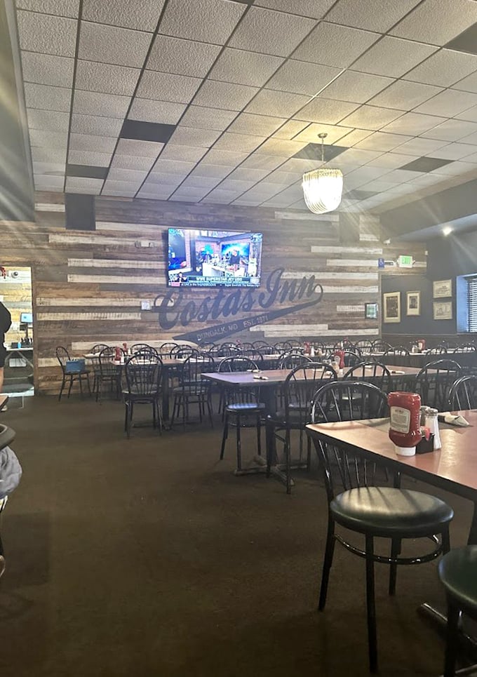 Step inside and you're greeted by rustic wood paneling and the Costas logo – a no-frills temple to Maryland's most sacred culinary tradition.