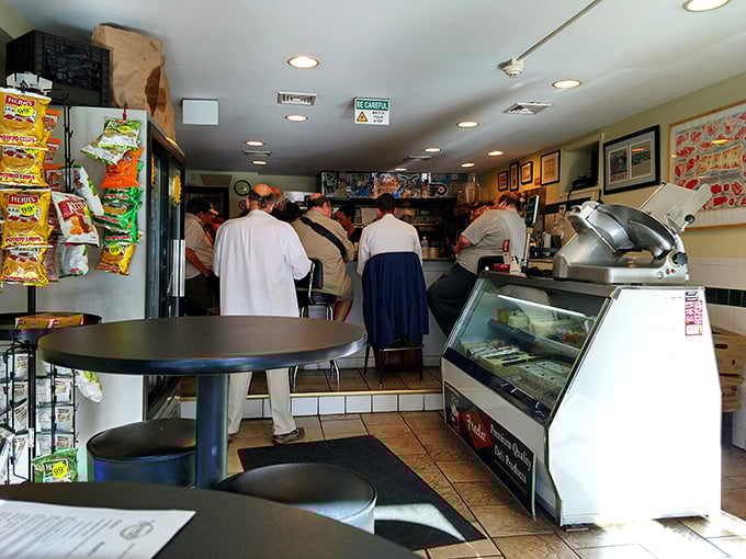 The lunchtime rush at Vincenzo's – where patience isn't just a virtue, it's the price of admission for sandwich perfection.