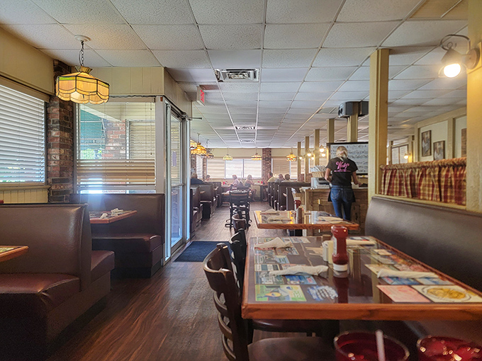 Classic diner ambiance with a Florida twist—Tiffany-style lamps cast a warm glow over booths where breakfast dreams come true.