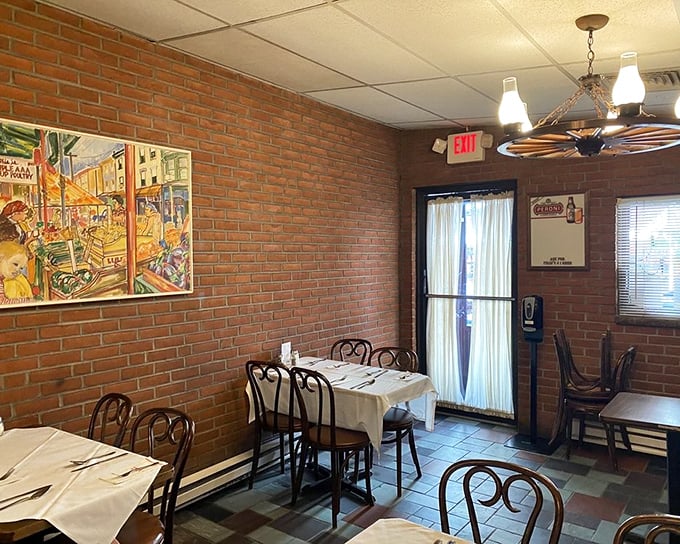 Simple brick walls and classic bistro chairs create the perfect backdrop for food that's anything but simple. No distractions needed when the pasta is this good.