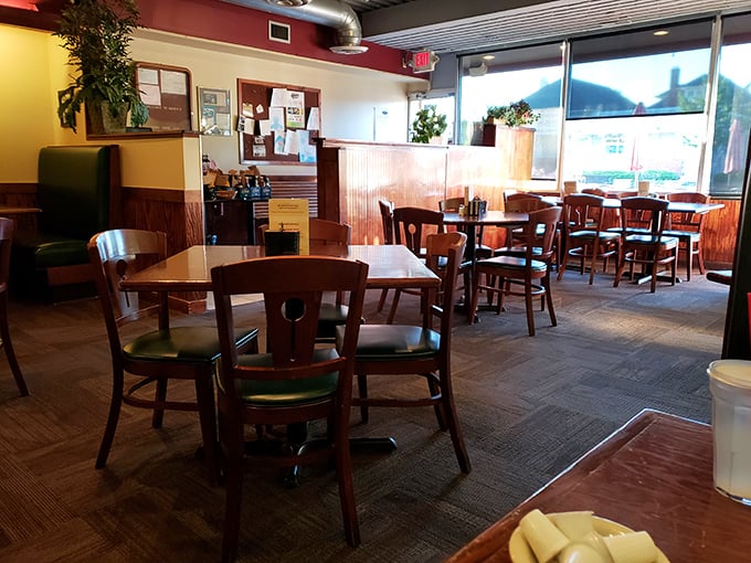 Warm wood paneling and comfortable seating create that perfect "neighborhood joint" atmosphere where conversations flow as freely as the coffee.