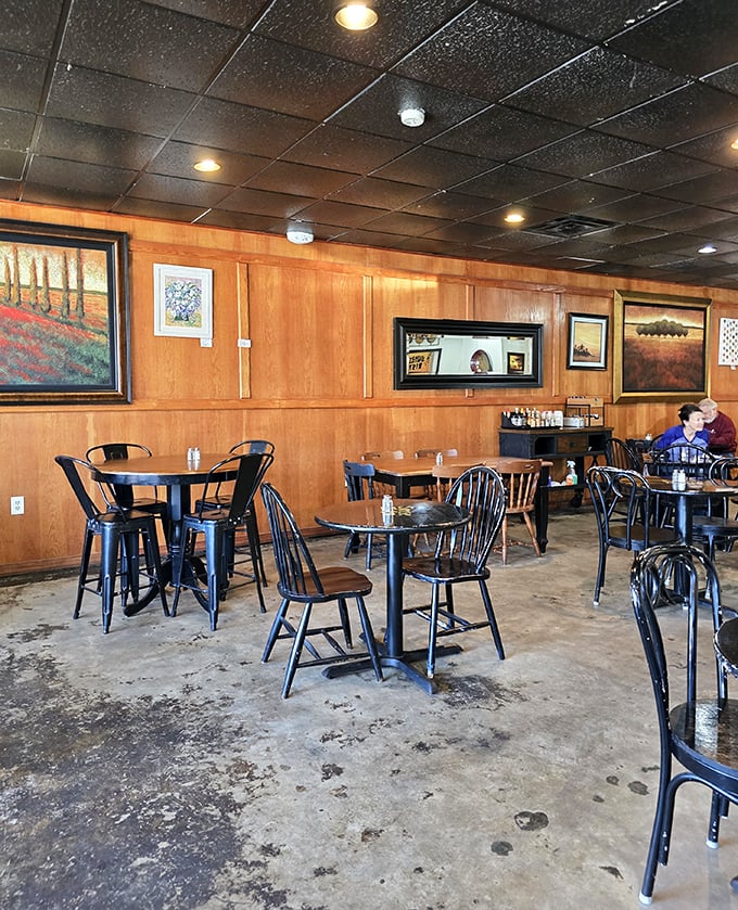 Wood-paneled walls adorned with local artwork create the perfect backdrop for morning conversations. It's like eating in your cool aunt's living room—if she could cook like a dream.