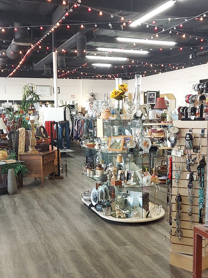 String lights create a boutique atmosphere that says "this isn't your grandmother's thrift store"—though she'd absolutely love shopping here too.