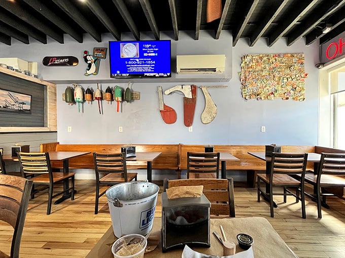 Nautical touches adorn the walls while wooden tables await their brown paper covering—the universal signal that delicious mess-making is encouraged.