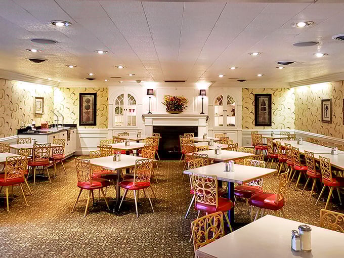 Step inside and you're transported to the golden age of dining—ornate chairs, patterned wallpaper, and a fireplace that says "stay awhile, calories don't count here."