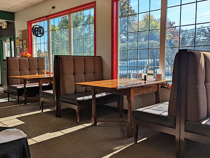 Sunlight floods through red-framed windows, warming the cozy booths where pierogi dreams come true.